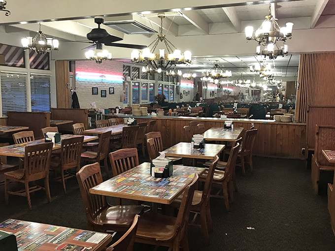 A dining room designed for lingering conversations and second helpings. Those wooden chairs have witnessed countless "just one more bite" moments.