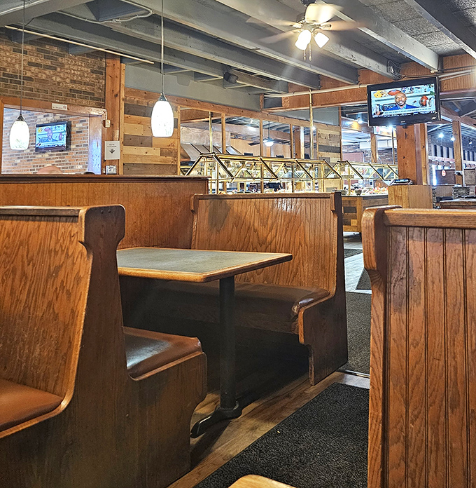 Church pew-style booths create the perfect sanctuary for worship at the altar of Southern cooking. Hallelujah and pass the napkins.
