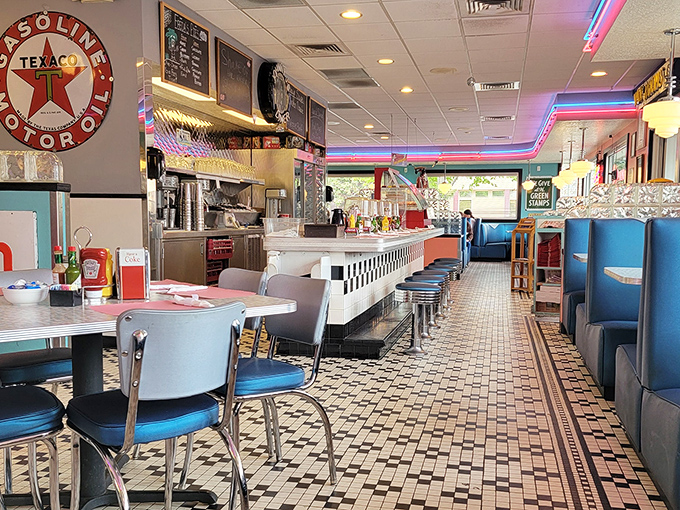 Chrome, neon, and tile&mdash;the holy trinity of diner design on full display down the length of this nostalgia corridor.