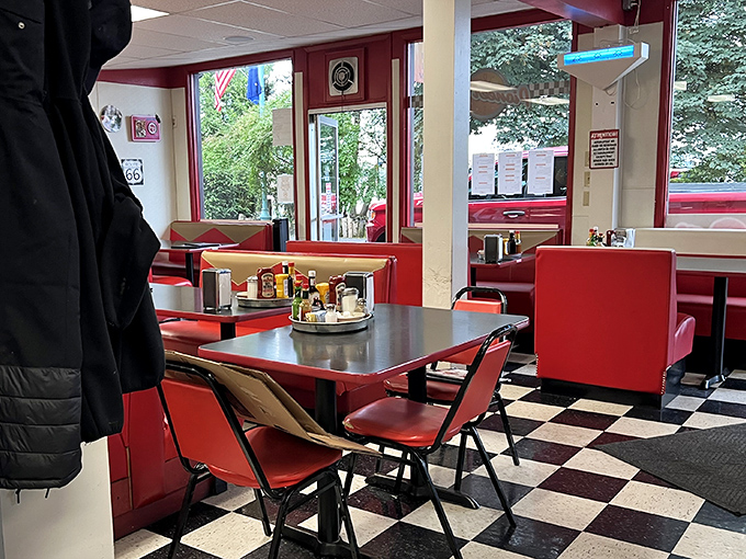 The classic diner checkerboard floor sets the stage for red vinyl seating that's hosted thousands of Alaskan stories and satisfied appetites.
