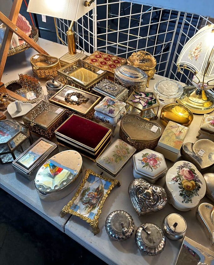 Ornate jewelry boxes and trinket holders gleam under market lights, each one promising to organize your treasures while being a treasure itself.