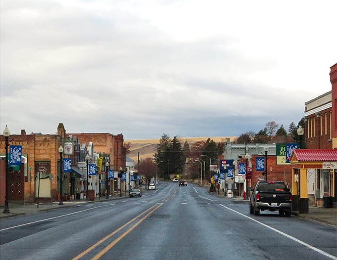 Main Street after rain captures Pomeroy's quiet dignity. Where traffic jams involve waiting for a tractor, not thousands of commuters.