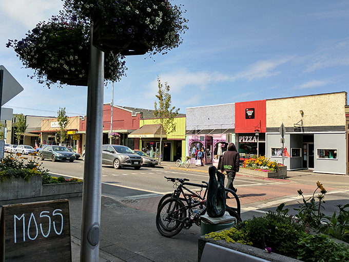 Downtown storefronts painted in cheerful colors invite exploration, where locally-owned shops prove retail therapy doesn't require big city prices.
