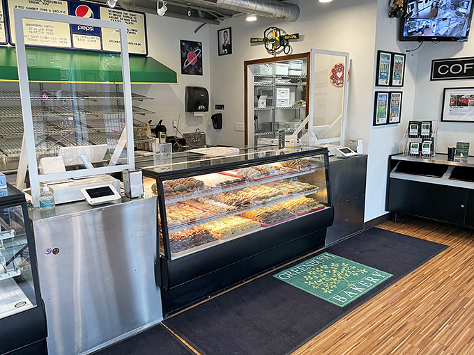 The display case—half empty or half full? Either way, it's a testament to Madison's excellent taste in morning indulgences.