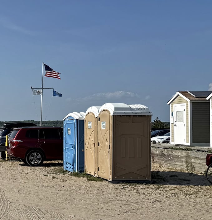 Beach essentials: sun, sand, and yes, portable facilities. The minimal amenities are part of East Beach's charm&mdash;civilization's bare necessities in paradise.