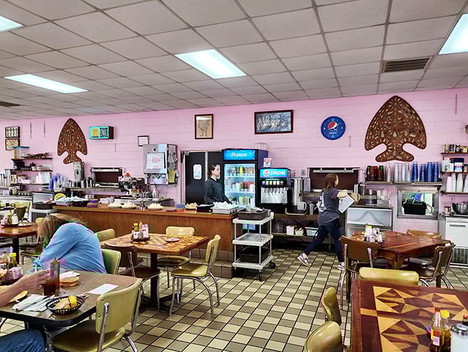 The service counter buzzes with efficiency while the fish-shaped wall decorations remind you that you're somewhere wonderfully unique.