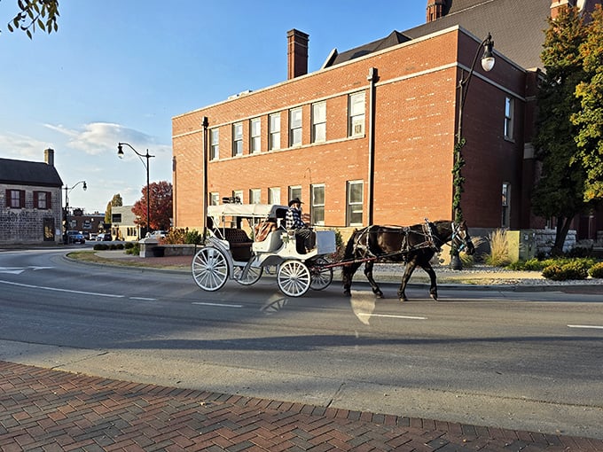 A horse-drawn carriage clip-clops through town, offering rides that are equal parts transportation and time machine.