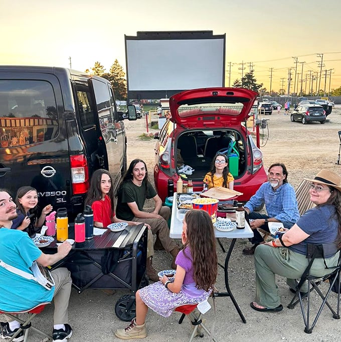 Tailgating meets cinema as families create their own perfect viewing nests—dinner and a movie reimagined for the great outdoors.