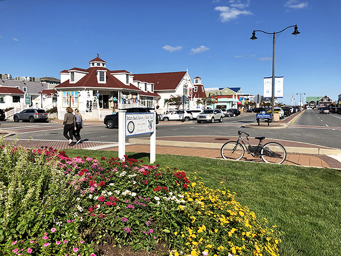 Bethany's downtown bursts with colorful flower beds and coastal charm &ndash; where bicycles parked casually hint at the town's walkable, neighborly vibe.