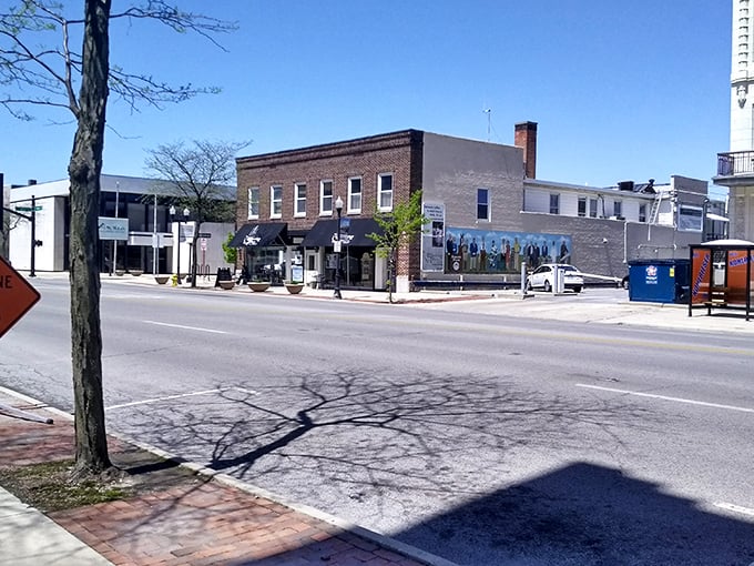 Historic brick buildings line Lima's quiet downtown street, showcasing the affordable charm of small-town Ohio living.