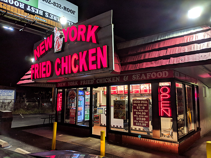 Bold red lettering against weathered brick tells the story of a place that's earned its neighborhood stripes.
