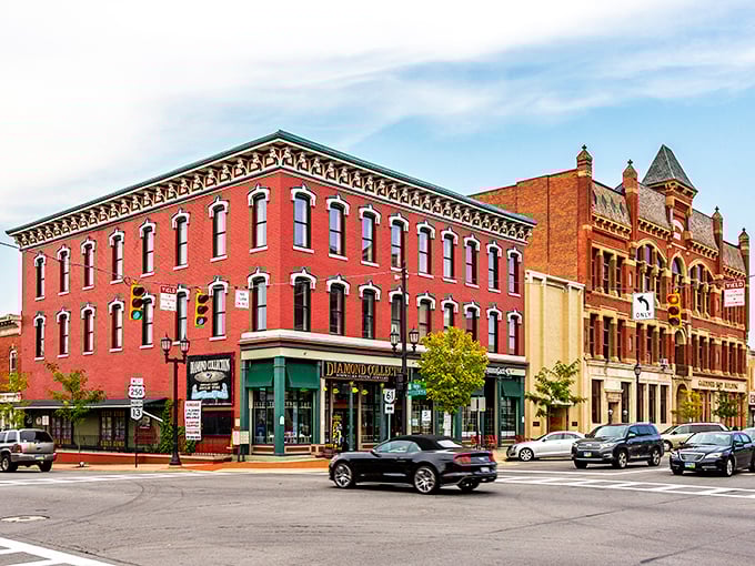 Sunset paints Norwalk's Main Street in golden hues, transforming ordinary brick buildings into something magical.