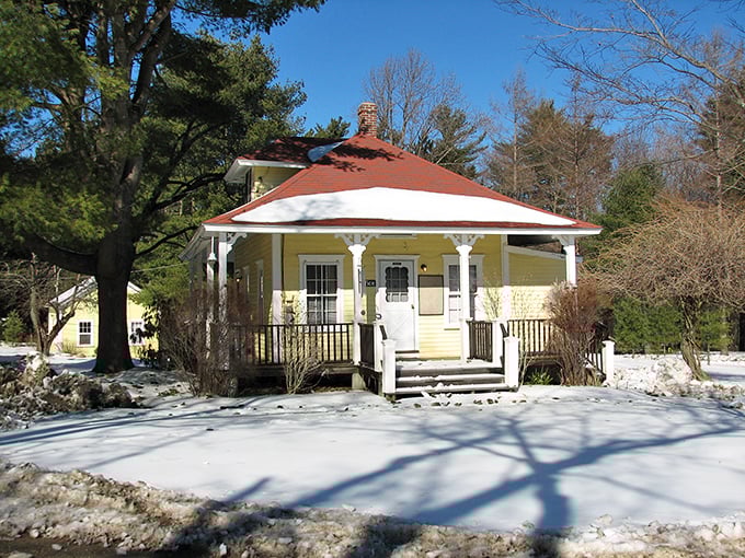 This charming yellow cottage with its welcoming front porch shows off Pascoag's cozy residential character perfectly.