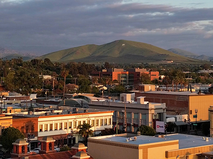 Sunset bathes Porterville's downtown in golden light, highlighting the affordable small-town charm that makes it perfect for retirees.