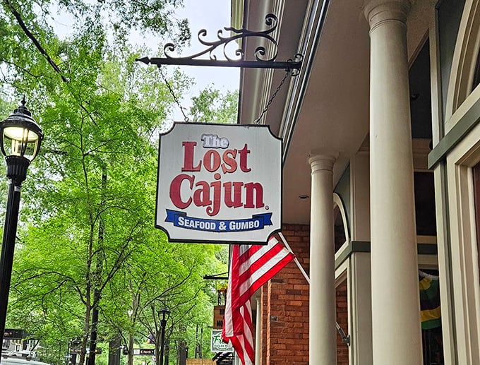 The Lost Cajun's inviting sign promises a taste of Louisiana in the heart of downtown Greenville.