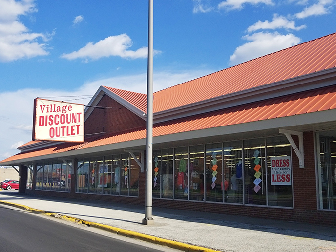 The classic brick building and red roof of Village Discount Outlet have sheltered countless treasure hunters.