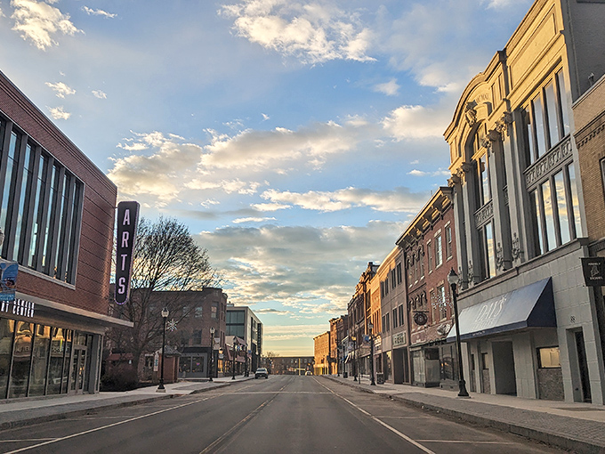 Sunset bathes Waterville's downtown in golden light, highlighting the urban amenities available at prices that respect your fixed income.
