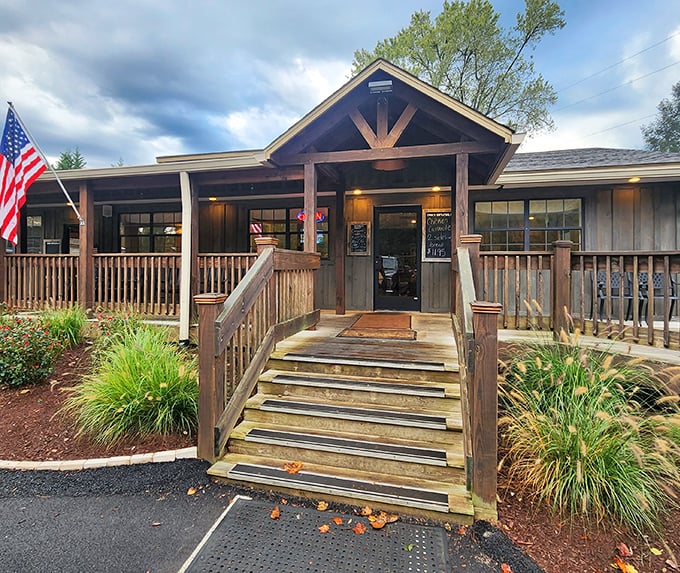 Wooden beams, welcoming steps, and an American flag—Trish's Mountain Diner serves comfort food with a side of Smoky Mountain charm.