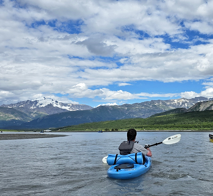 Kayaking near North Pole offers breathtaking mountain views and a reminder that Alaska's wilderness begins where Santa's workshop ends.