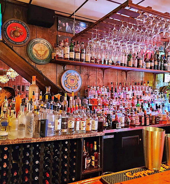 A bar stocked for every occasion, with military emblems watching over your drinking decisions. Salute your taste buds with something special.