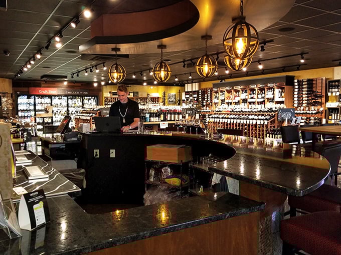 Behind this bar lies liquid happiness in bottles of every shape and size, illuminated like treasures in an adult candy store.