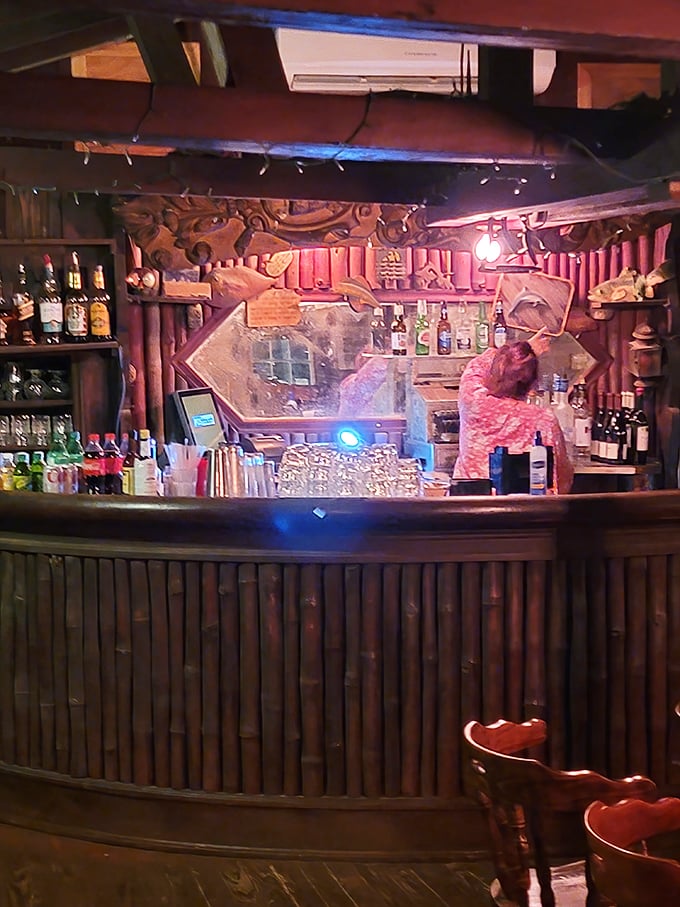 The bamboo-adorned bar looks like it was transplanted directly from a Hemingway novel. Just add rum and conversation.