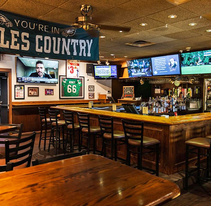 The bar area proudly declares "Eagles Country"&mdash;where game day feels like a community event and strangers become friends over touchdowns and good beer.