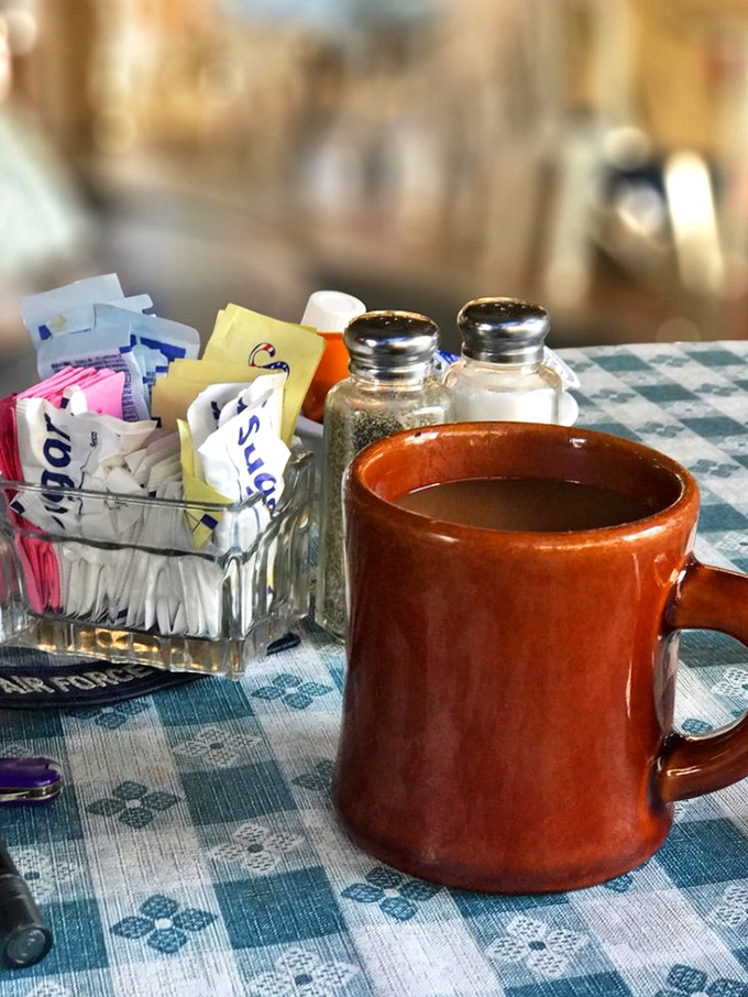 The humble brown coffee mug—steadfast companion to countless conversations, newspaper readings, and the gentle contemplation of life's great mysteries.