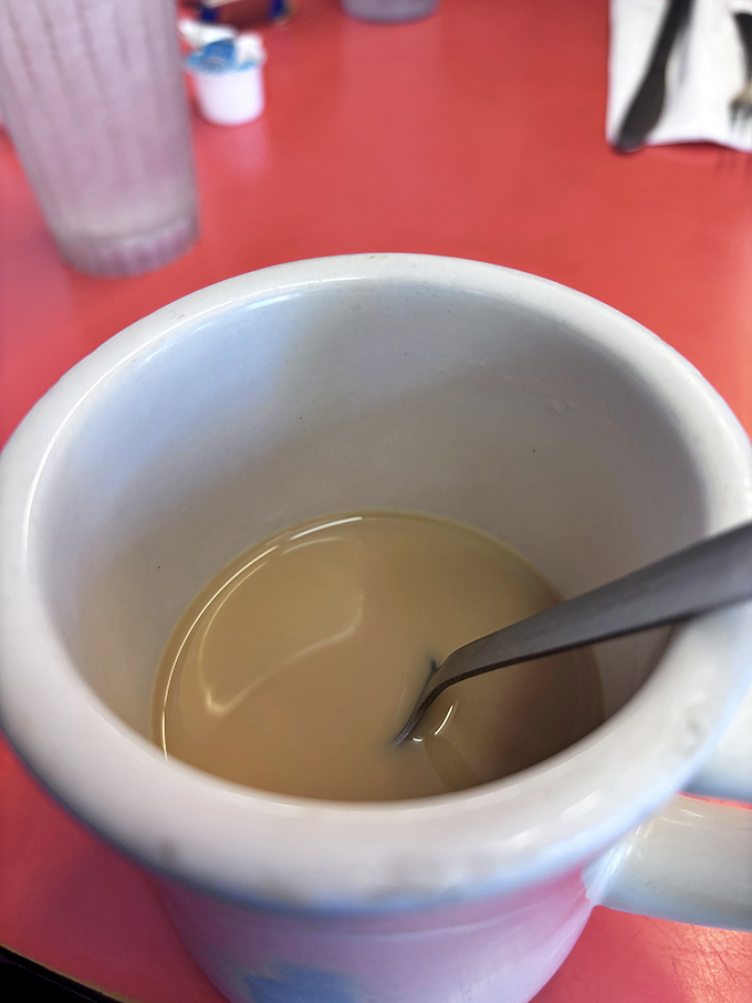 The humble coffee mug, containing the elixir that transforms grumpy humans into functioning members of society one sip at a time.