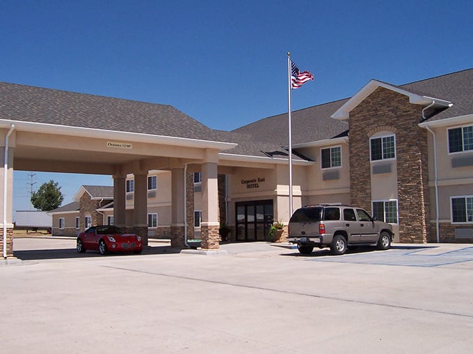 The Corporate East Hotel offers travelers unexpected comfort with prairie hospitality and those stone accents that whisper "Kansas."