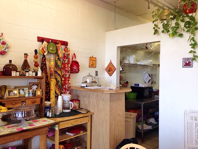 The counter area showcases New Mexican charm. Colorful chile ristras and handcrafted items create an atmosphere as authentic as the food itself.