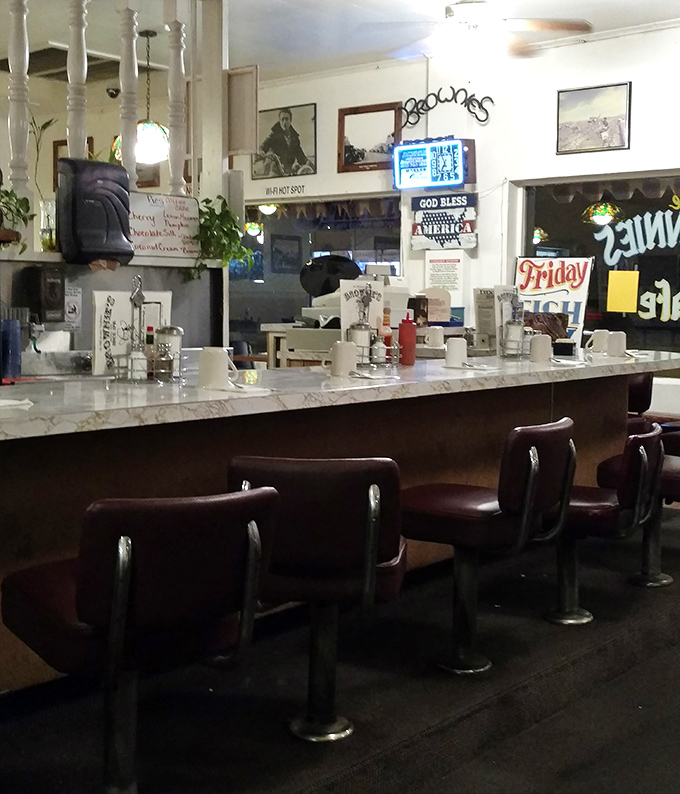 The counter seating&mdash;where solo diners become temporary neighbors and coffee refills arrive before you even ask.