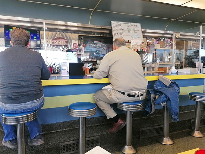 Elbow-to-elbow at the counter&mdash;where the best conversations happen between strangers united by their love of good food.