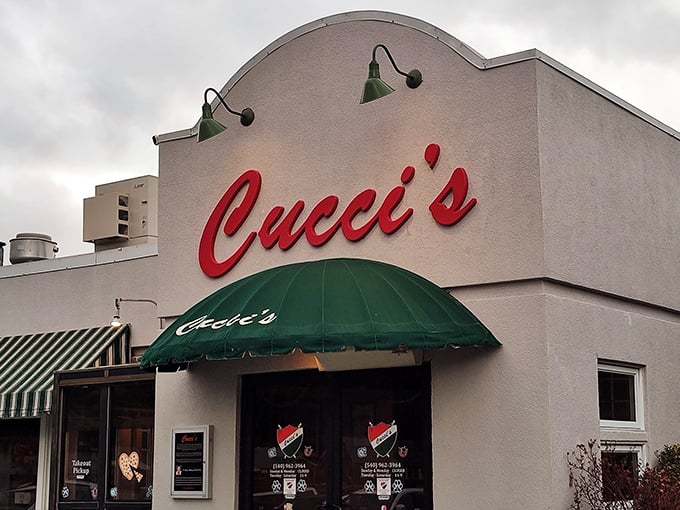 Cucci's red sign promises comfort food that hugs your soul. Pizza in the mountains somehow tastes better, especially when shared.