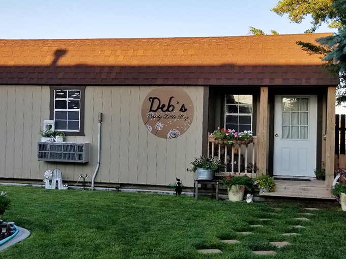Deb's Dandy Little Shop embodies small-town entrepreneurial spirit with its charming cottage aesthetic and welcoming front porch vibes.