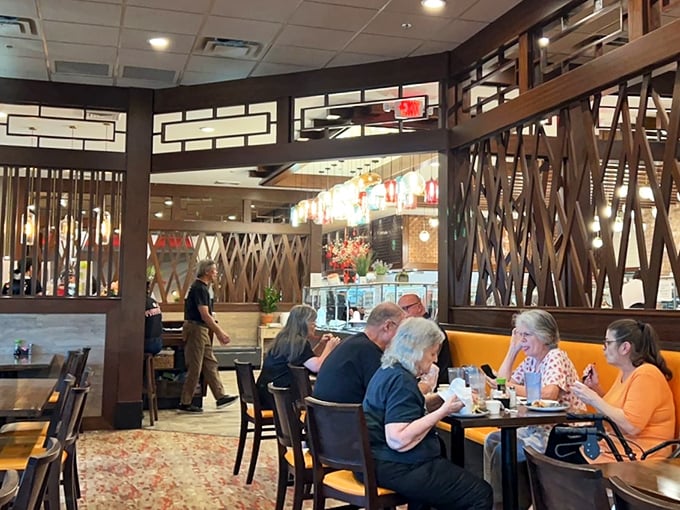 Diners settle into the comfortable rhythm of buffet life—the strategic planning, the careful selection, the triumphant return with a well-curated plate.