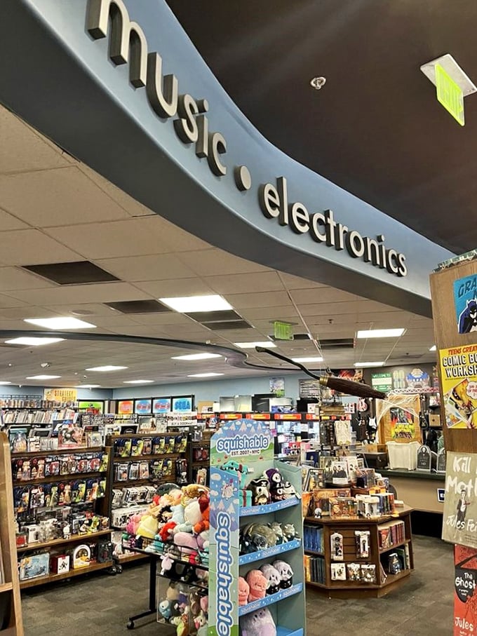 The electronics section curves invitingly, promising gadgets and gizmos aplenty. Even the stuffed "Squishamallows" seem to be eyeing the tech.