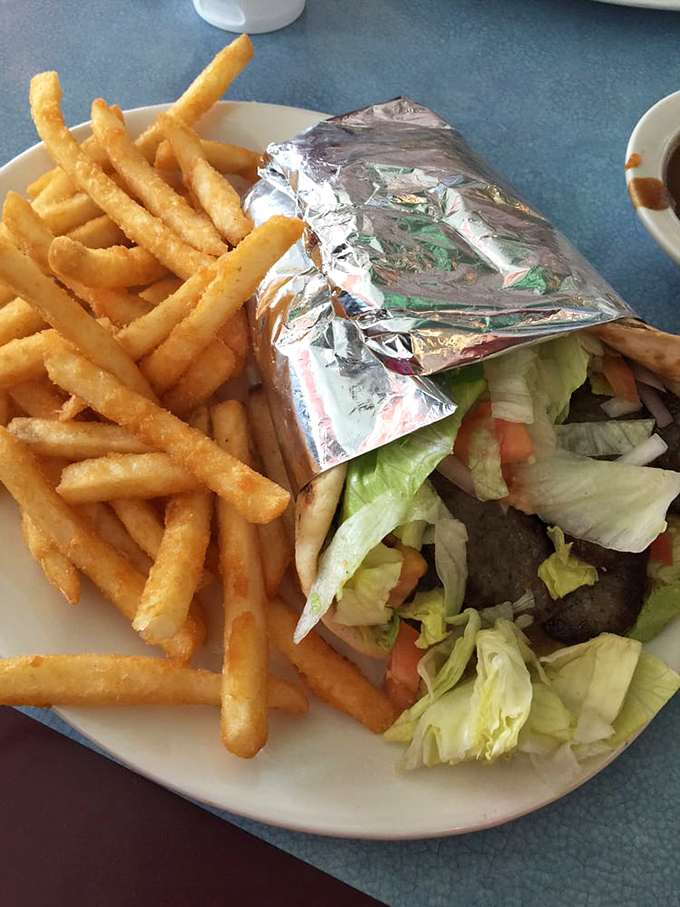 A gyro that's dressed for success&mdash;wrapped in foil like the rock star of handheld meals it truly is. Those fries aren't just sidekicks!