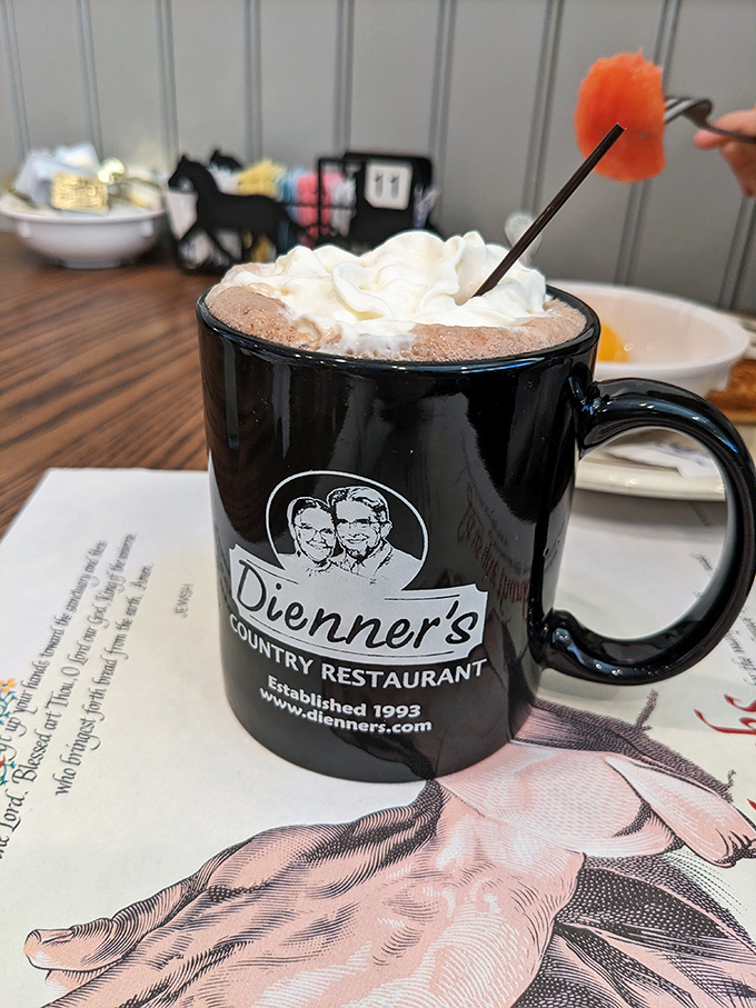 Hot chocolate elevated to an art form &ndash; topped with whipped cream and served in a mug substantial enough to warm hands that have been shopping all morning.