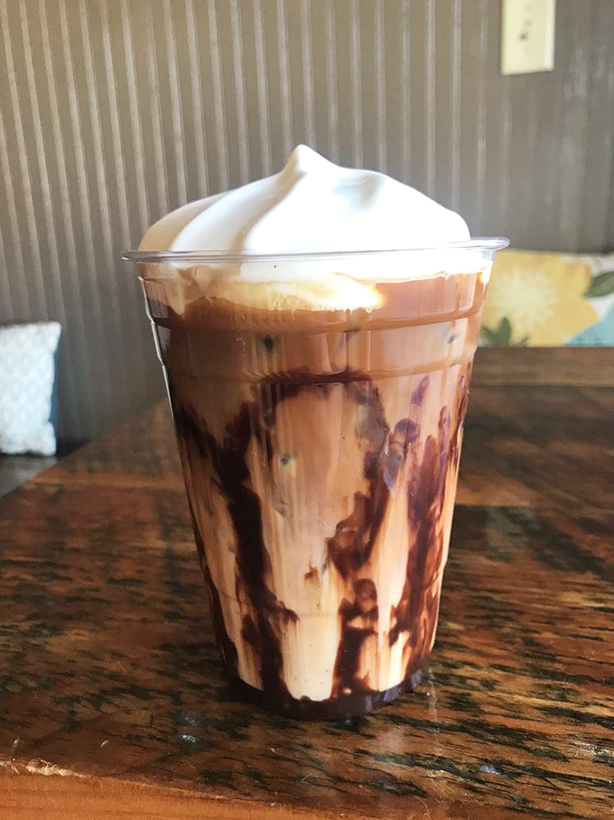 Coffee art in a cup—where mocha meets whipped cream in a swirling dance of morning motivation.