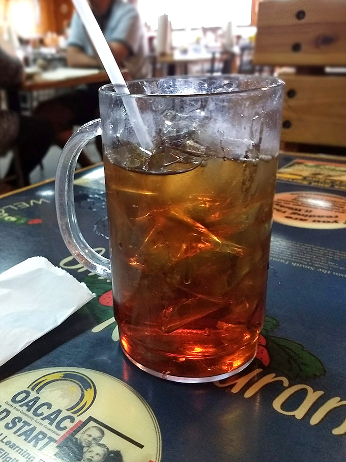 A frosty mug of sweet tea &ndash; the house wine of the South &ndash; sitting on a tabletop that's seen thousands of satisfying meals and conversations.
