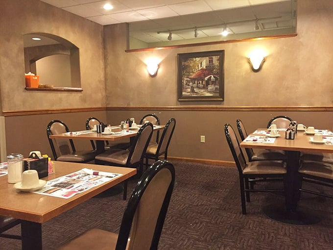 Cozy corner booths perfect for lingering conversations over coffee refills, where afternoon light streams through those signature arched windows.
