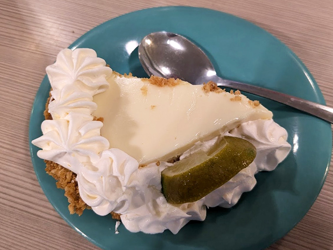 Key lime pie that strikes the perfect balance between sweet and tart, topped with clouds of whipped cream. The ideal finale to a seafood symphony.