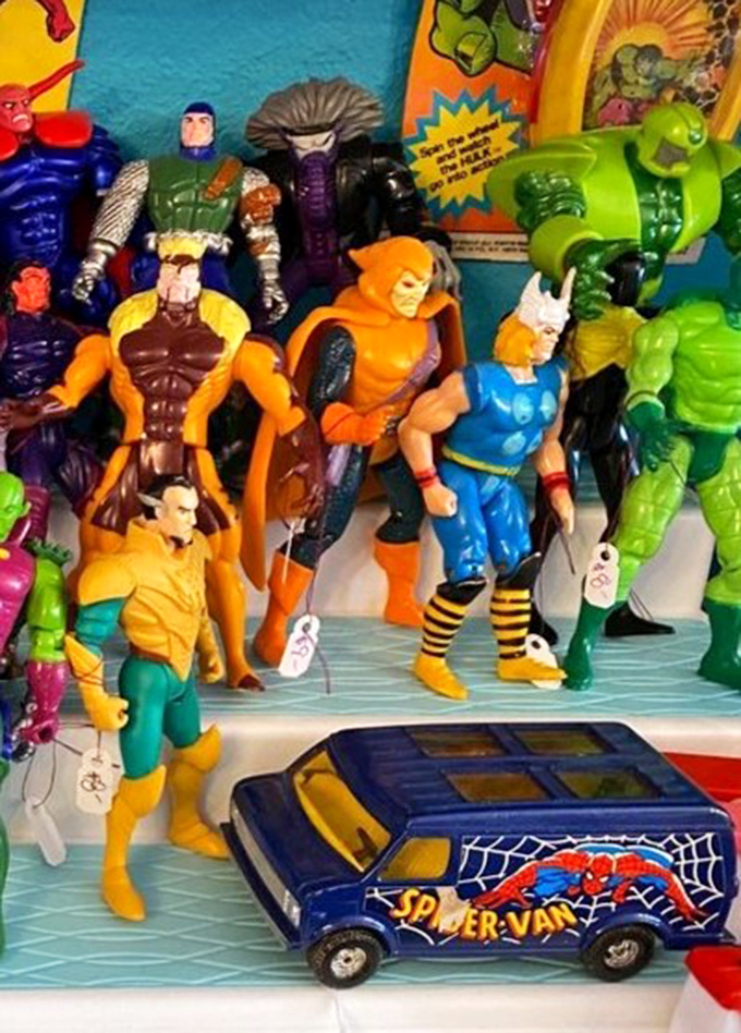 Marvel figures stand at attention, their vibrant costumes a reminder of when superheroes weren't quite so serious about their wardrobes.