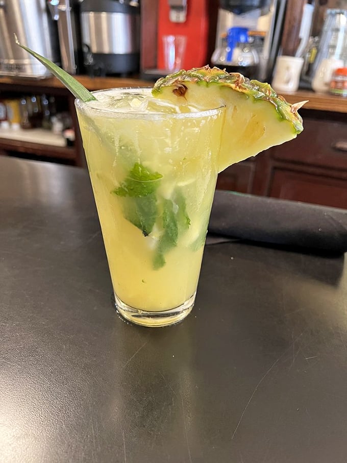 Not your average pineapple drink! This refreshing concoction with fresh mint is like a vacation in a glass, no passport required.