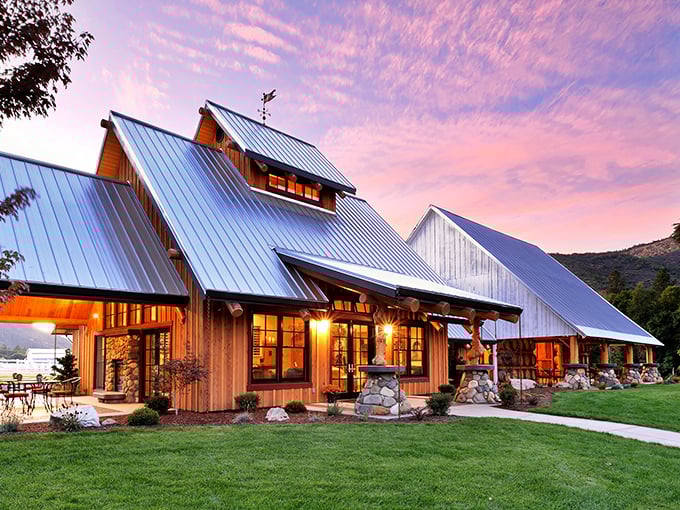 Red Lily Vineyards at sunset looks like someone painted the sky to match their marketing materials &ndash; nature showing off for the wine crowd.