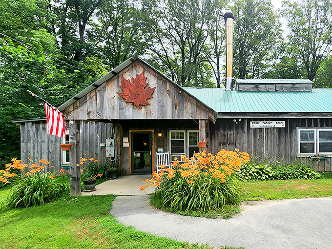 Robb Family Farm embodies Vermont's rustic charm with weathered wood, a proud maple leaf, and flowers that seem to say, "Come in, we've got syrup."