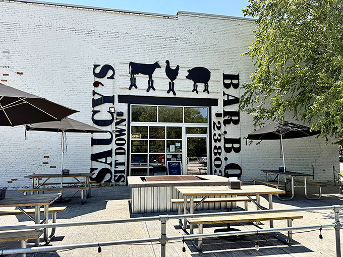 Saucy's BBQ's clever signage tells you exactly what you're in for – meat worth traveling for. Those picnic tables have witnessed many sauce-stained smiles and satisfied sighs.