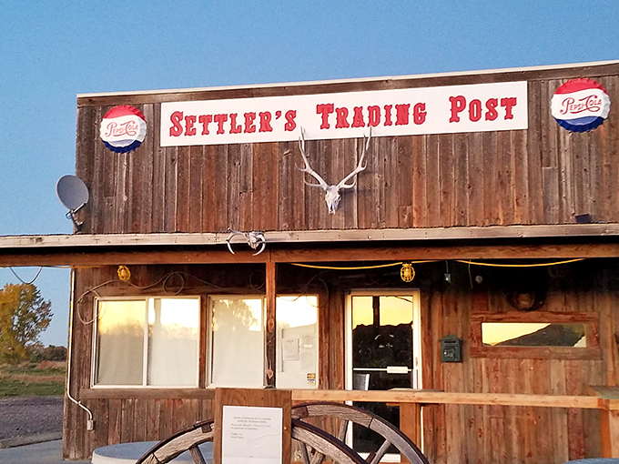 Settler's Trading Post channels frontier spirit with weathered wood and vintage signage&mdash;the kind of place where you half-expect to barter pelts for provisions.