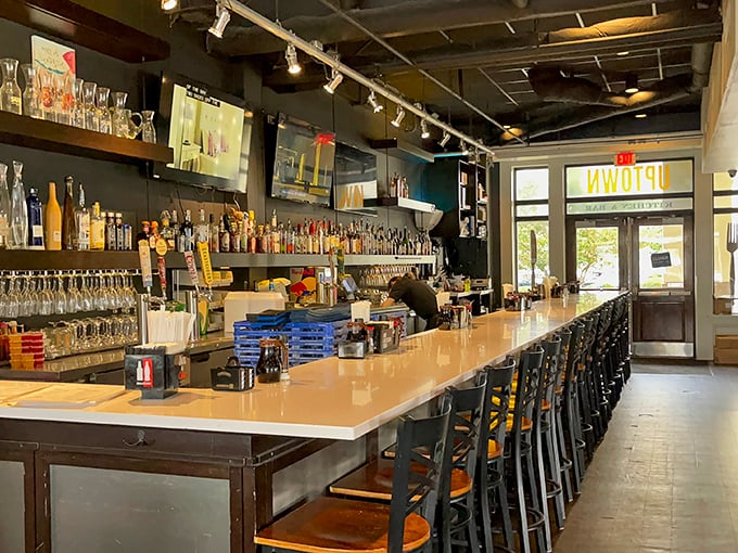 Behind the bar, skilled hands craft cocktails with precision. The impressive spirit selection ensures your thirst will be quenched in style.